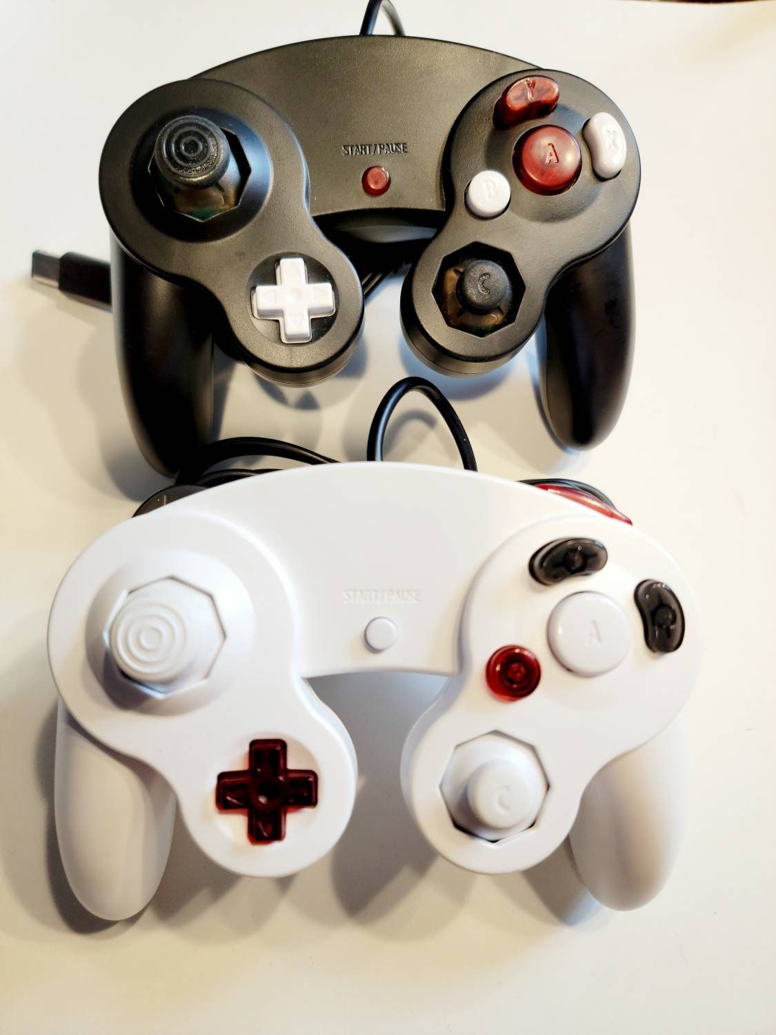 Two Silver Gamecube Black Controller With Black Controllers With One ...