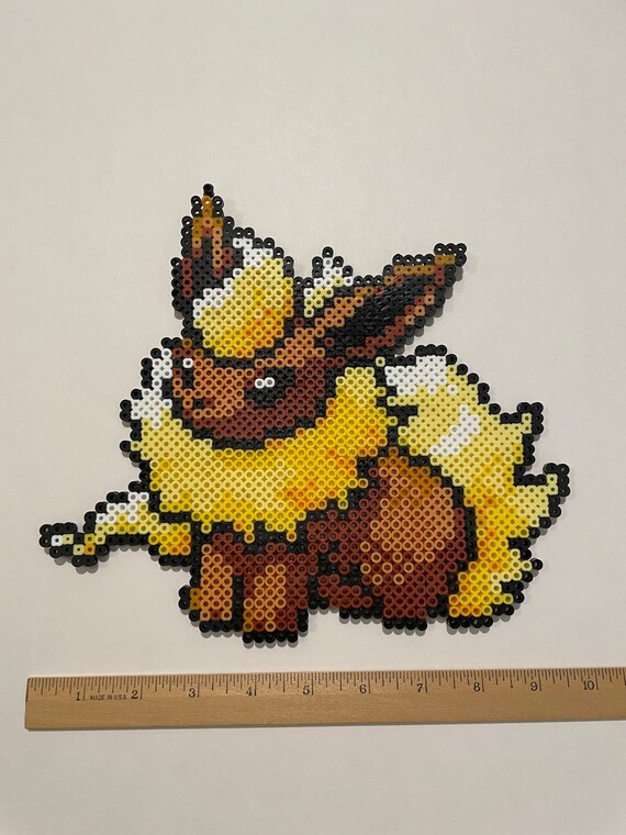 Flareon Sitting Flareon Knienke