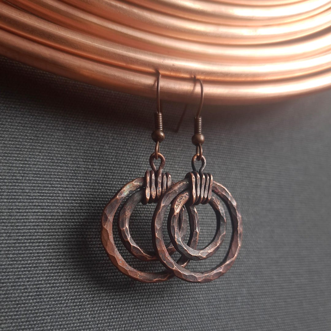 Handmade Rustic Copper Earrings With Hammered Rings and Coiled Wire Accents Exuding Unique ...