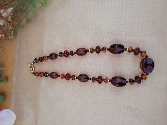 Dark amber coloured necklace - Gem