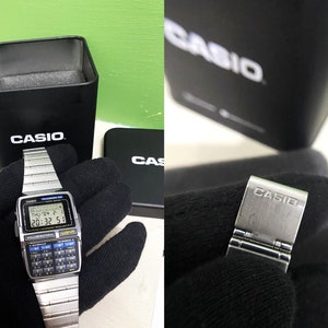 Execelent Nos Casio Dbc-63 Databank Telememo 50 Memory Calculator Watch 1990s Vintage / Mod ...