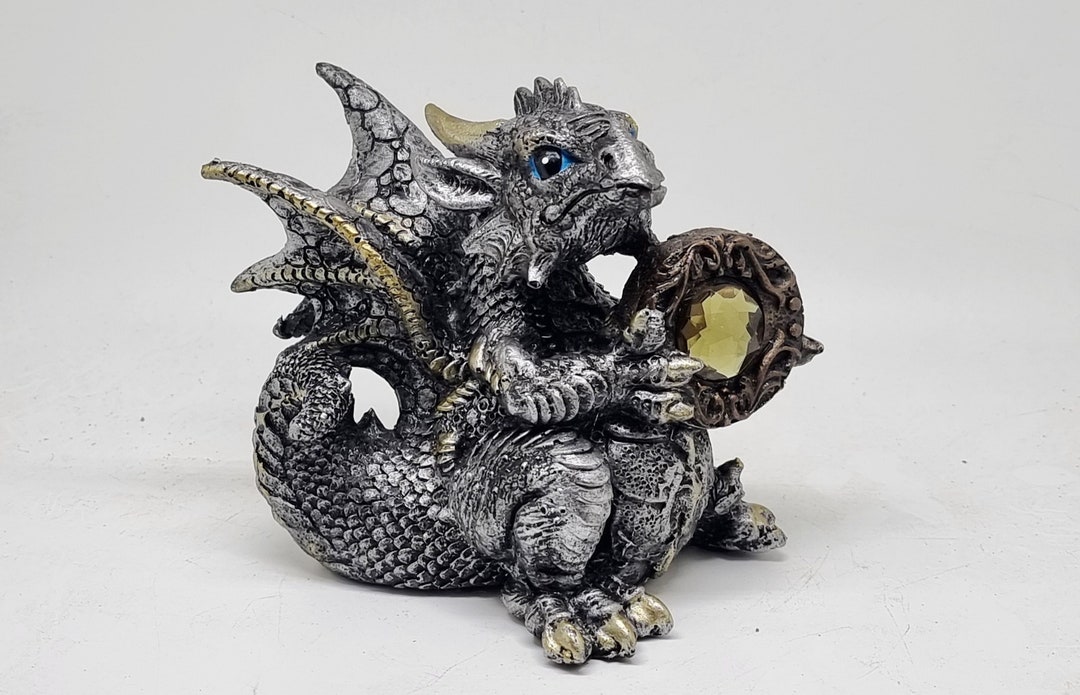 Beautiful a Earth Dragon Holding the Guardian Stone of the Elements ...