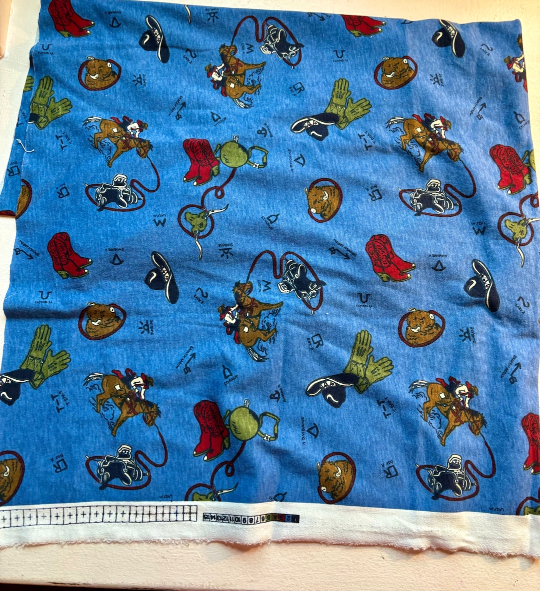 Cowboy Fabric Blue Background Intex Cowboy Pattern M Lazy M Stiirrup T ...