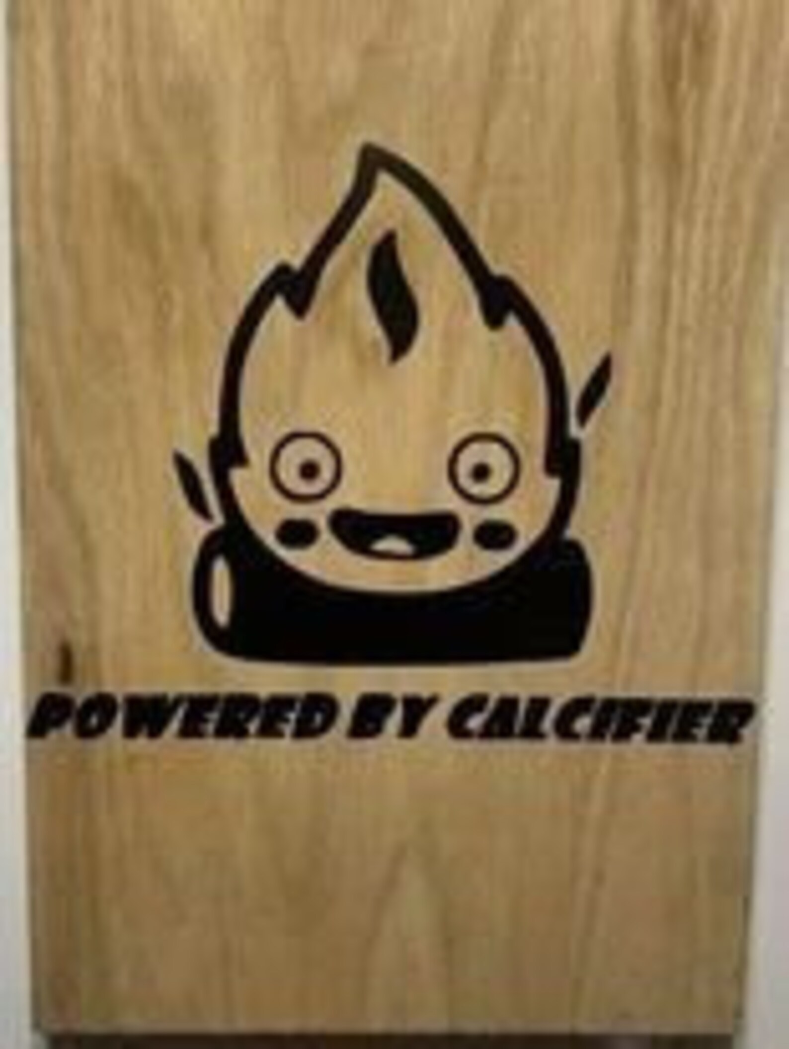Powered by Calcifer Vinyl Sticker - Etsy
