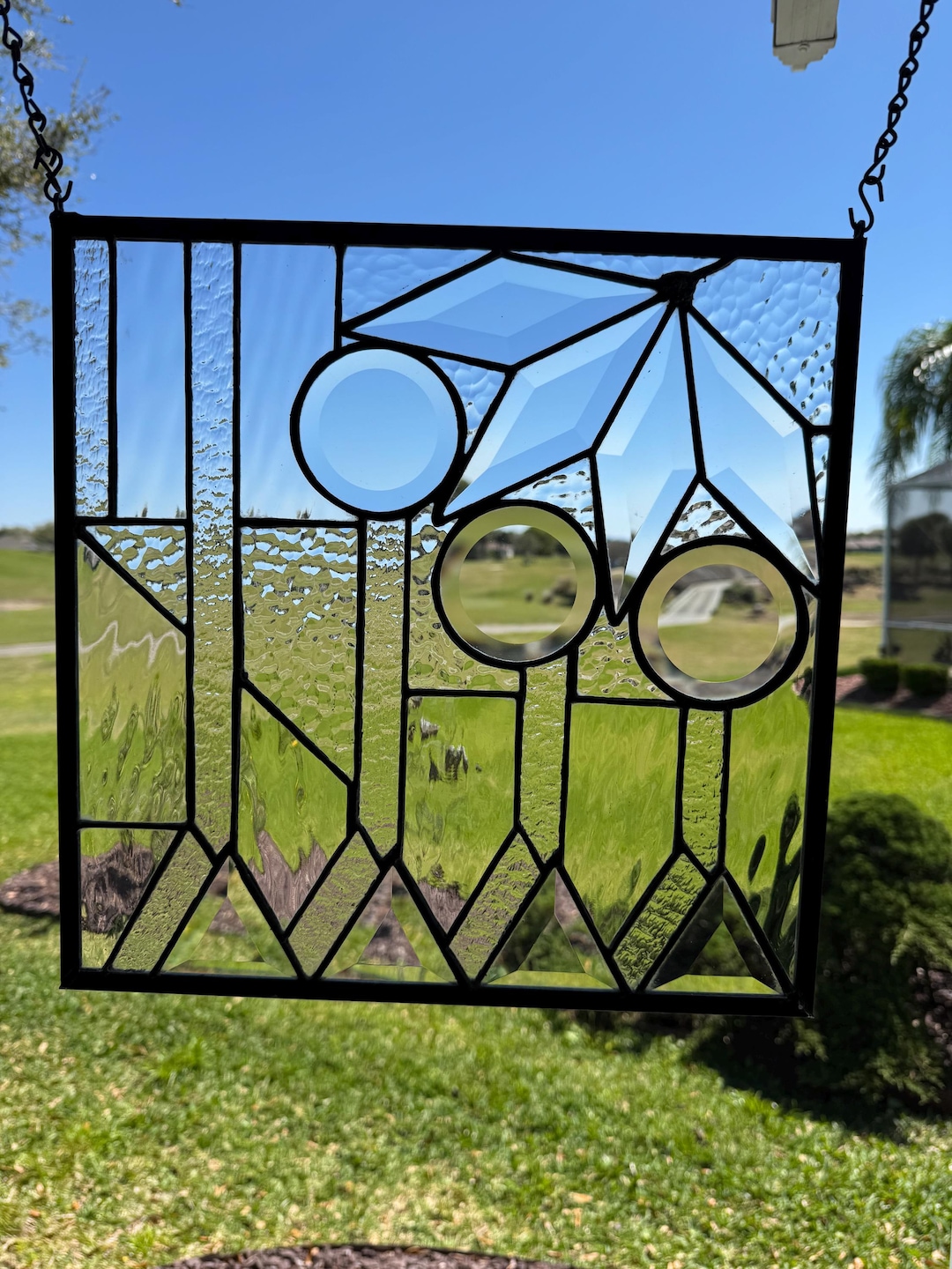 A Contemporary and Extremely Unique Beveled Glass Design in ...