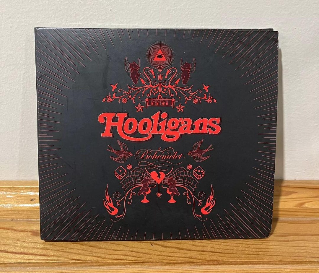 Hooligans Bohemelet CD. Includes Poster With Lyrics on Reverse Side. Has Fold Creases as It Has ...