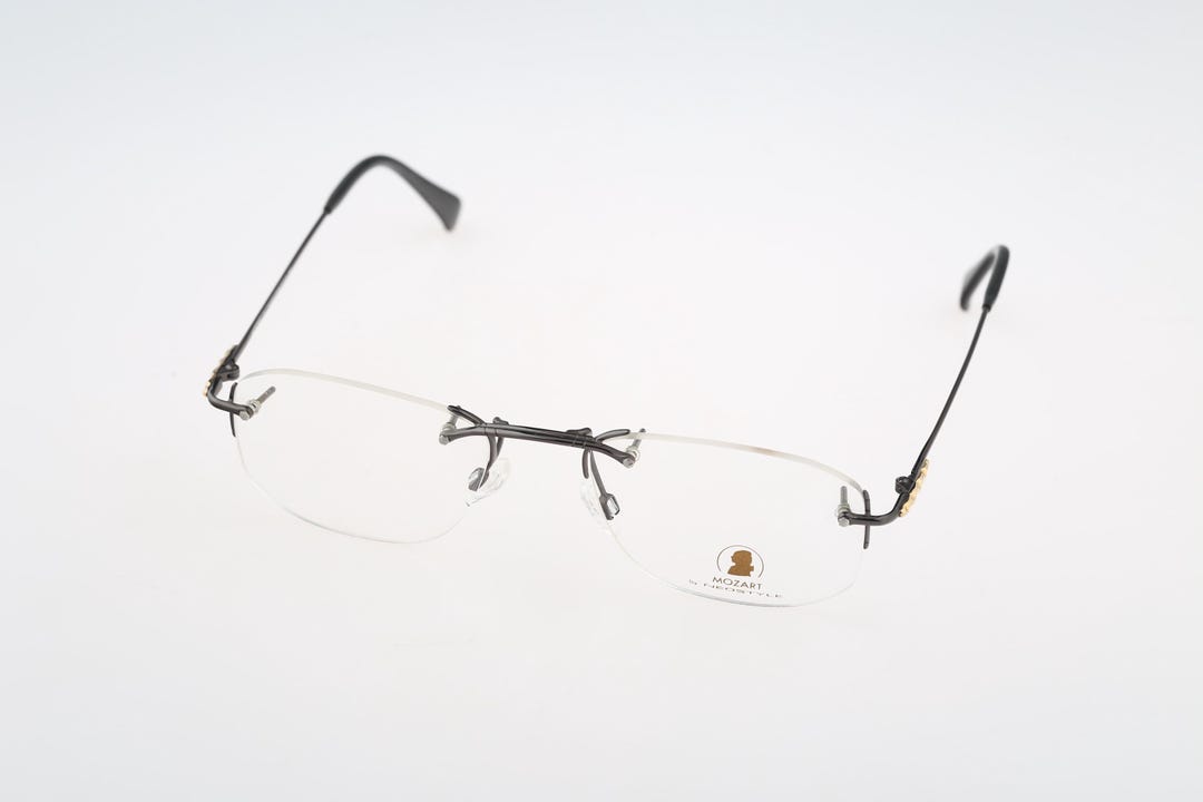 Mozart by Neostyle 32 357, Vintage 90s Gold and Gray Rimless Rectangle ...