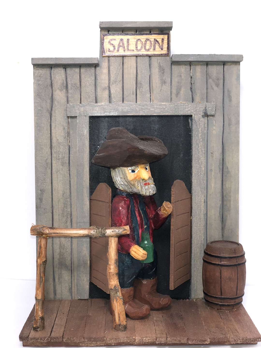 Beer Drinking Cowboy in Western Saloon With Barrel and Hitching Post ...