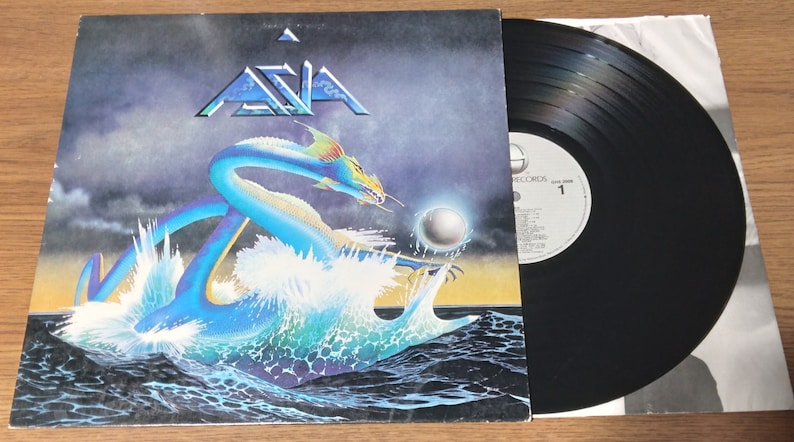 Asia asia 1982, Vinyl LP heat of the Moment, sole Survivor - Etsy