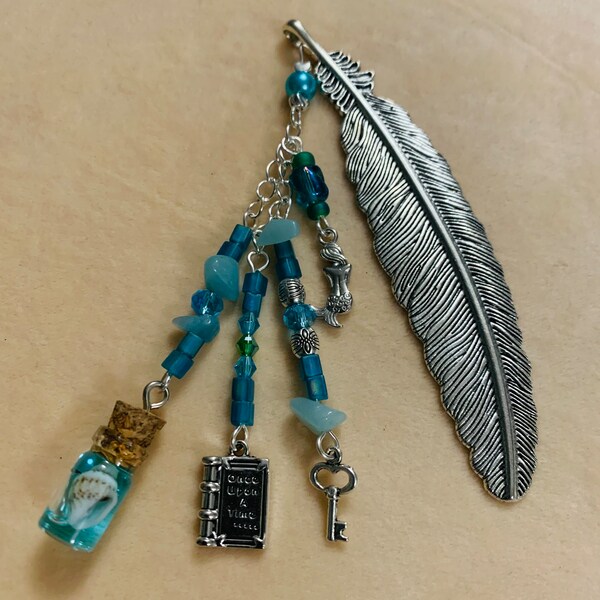 Feather Bookmark With a Red Tassel, Red Beads, a Silver Coloured Metal ...