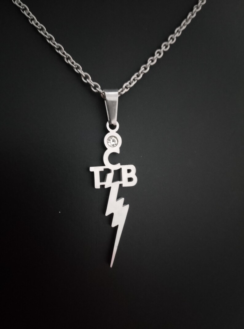 Elvis TCB Unique Exemplary With Zirconia Set in the Center Silver ...