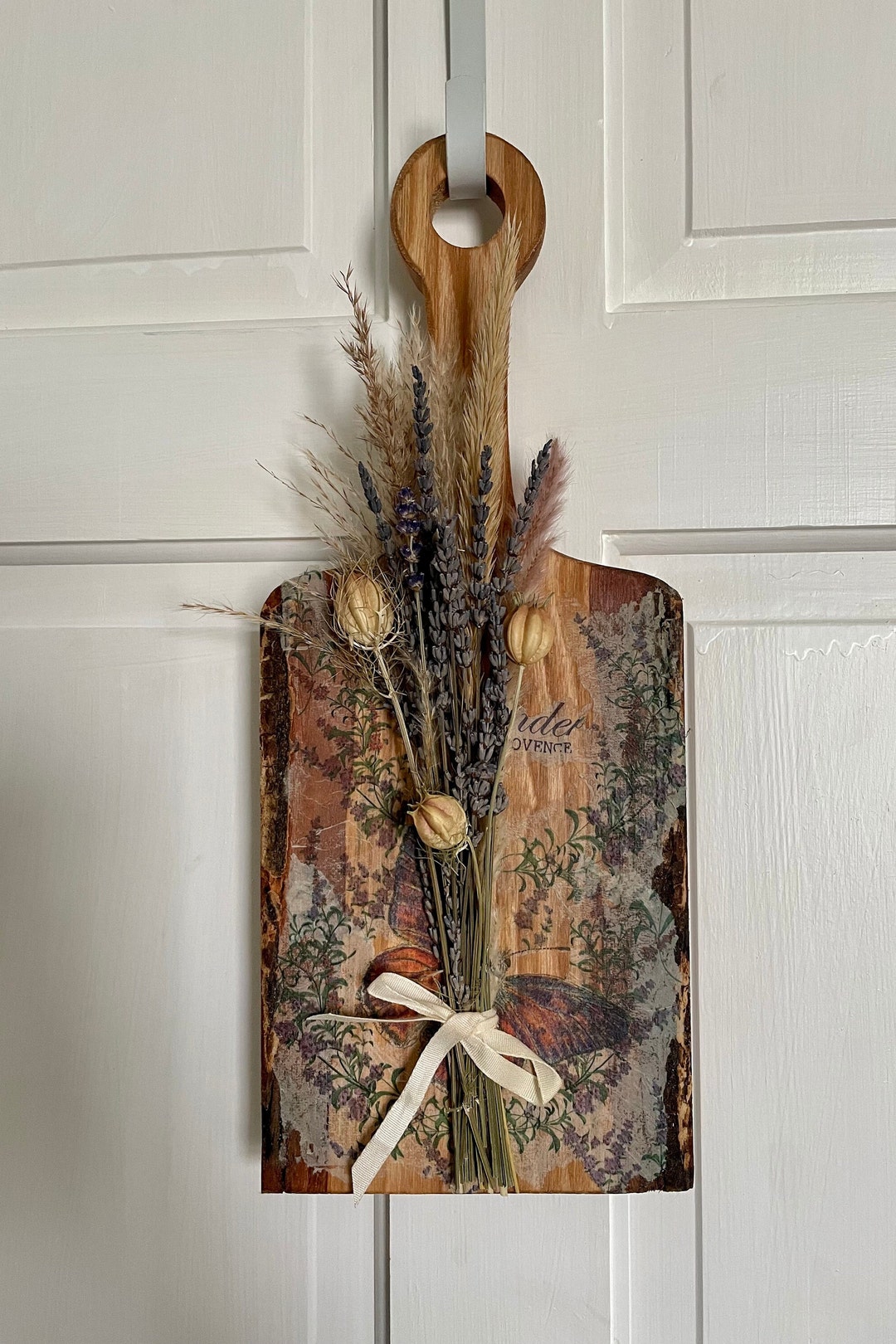 Hanging Wood Chopping Board Decorated With a Vase of Selected Dried ...