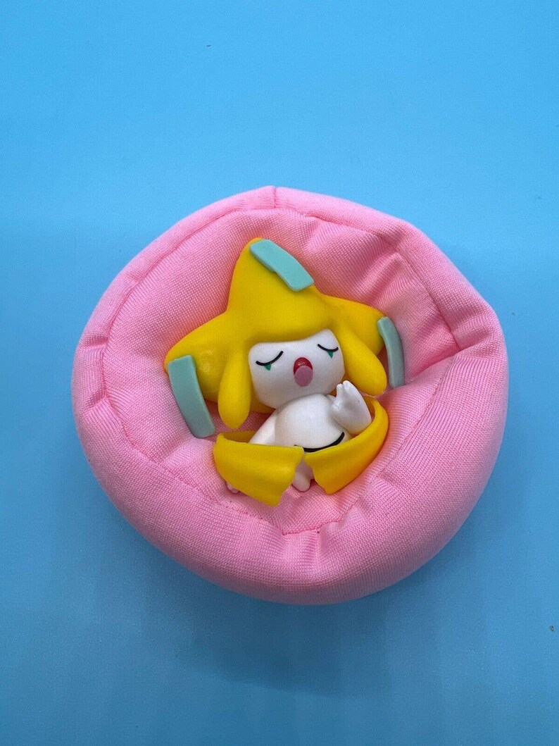 Pokemon Sleeping Jirachi PVC Figure on a Pink Sleeping Bag - Etsy