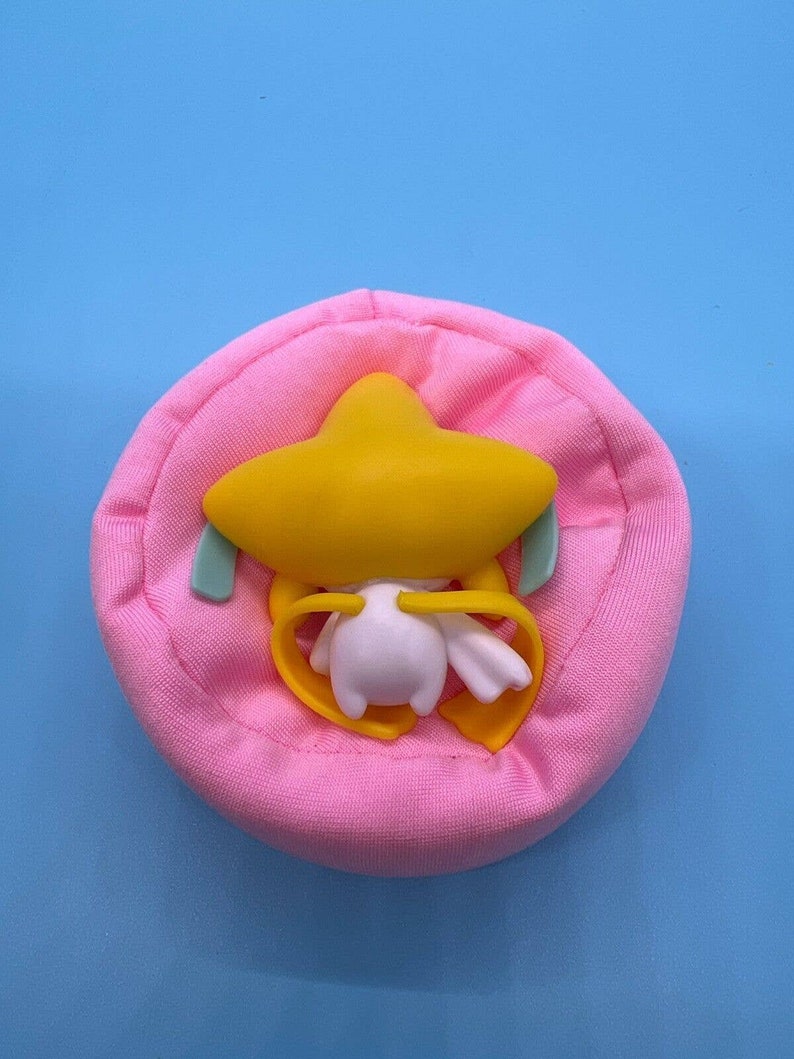 Pokemon Sleeping Jirachi PVC Figure on a Pink Sleeping Bag - Etsy