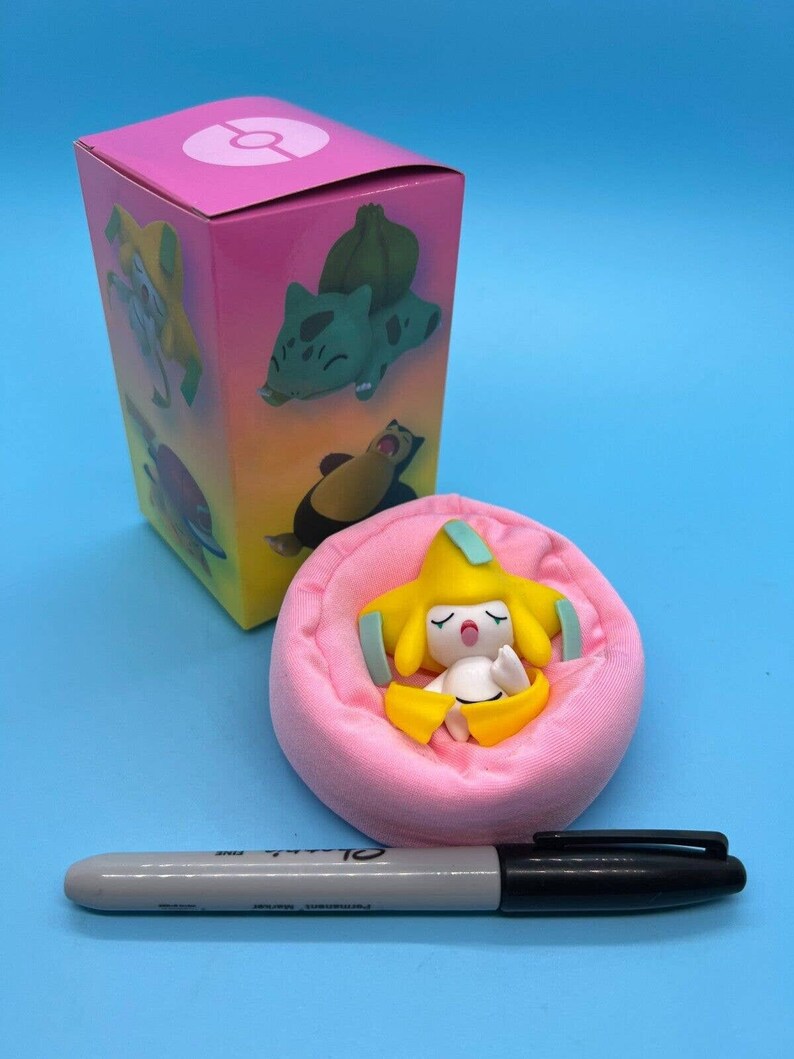 Pokemon Sleeping Jirachi PVC Figure on a Pink Sleeping Bag - Etsy