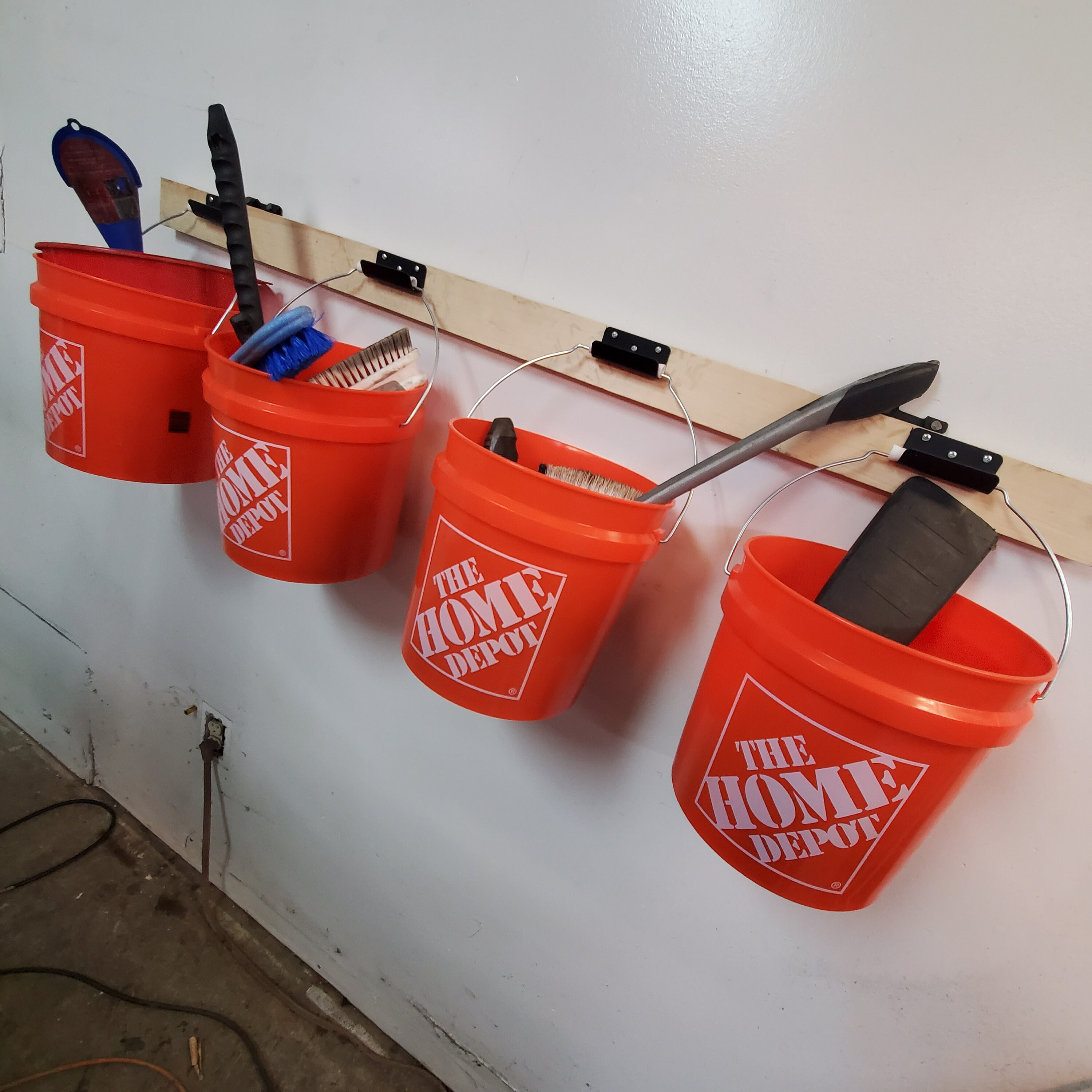 Garage Storage Solutions - 2.5 Gal Bucket Bracket System - 4 on 4 Ft ...