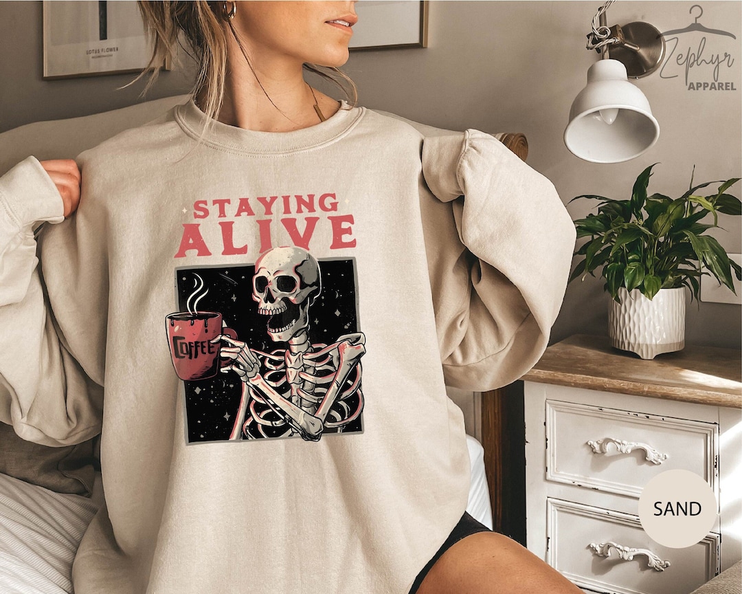 Staying Alive Skeleton Sweatshirt, Coffee Mug Holding Skeleton Vintage ...