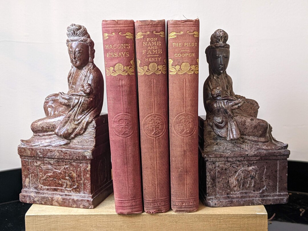 Pair of Carved Stone Figurines - Seated Individuals With Elaborate ...