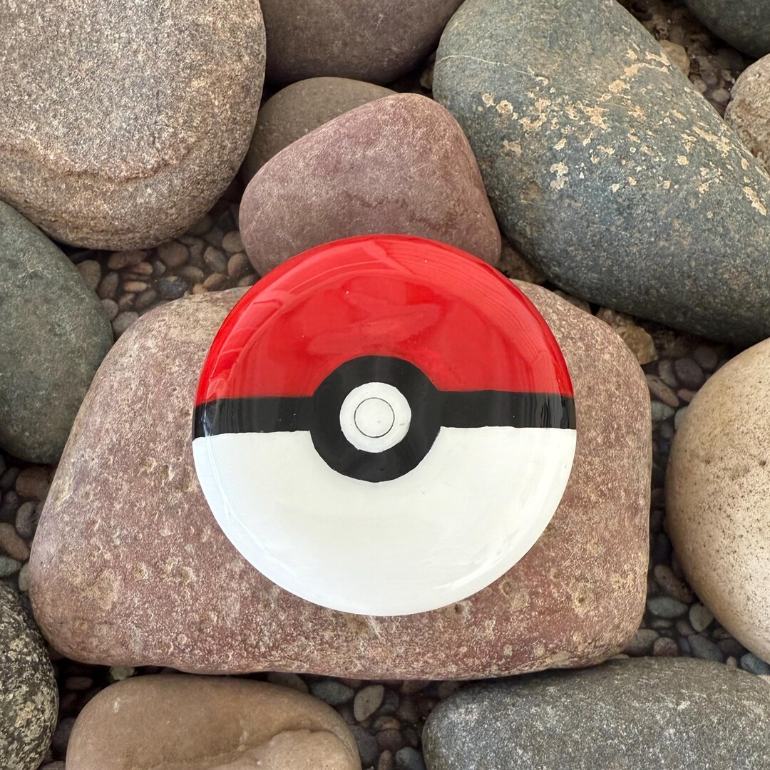 A Poké Ball, Also Known as a Monster Ball, Pokemon Ball - Stone by Val ...