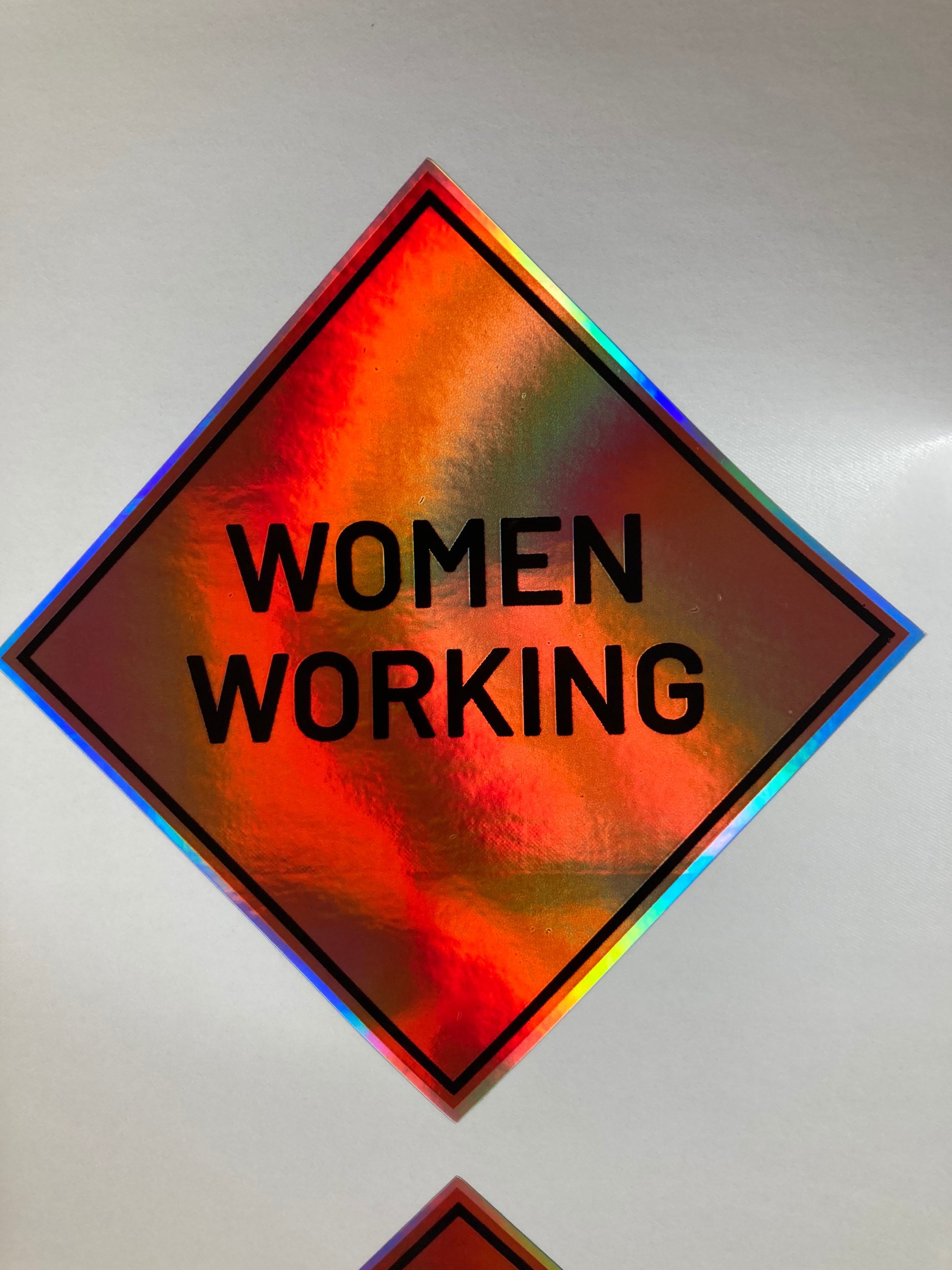 Woman Working Sign