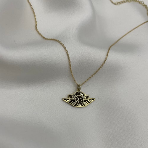 dior basketball necklace Syncro System