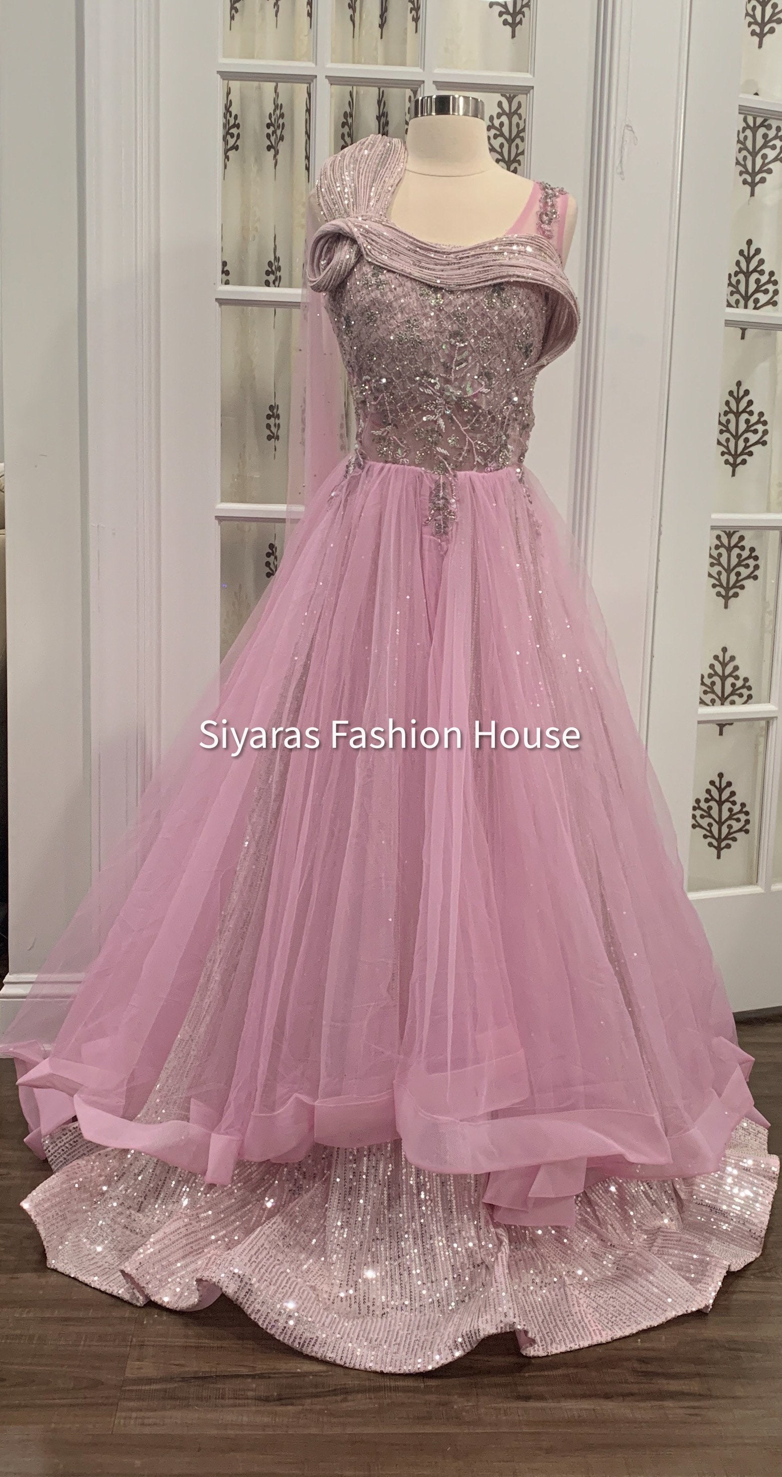 Elegant Designer Gown in Sequin and Net Material Suitable for Fashion ...