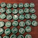 A Collection of 91 Sierra Nevada Beer Bottle Cap Green Beer Caps Black ...