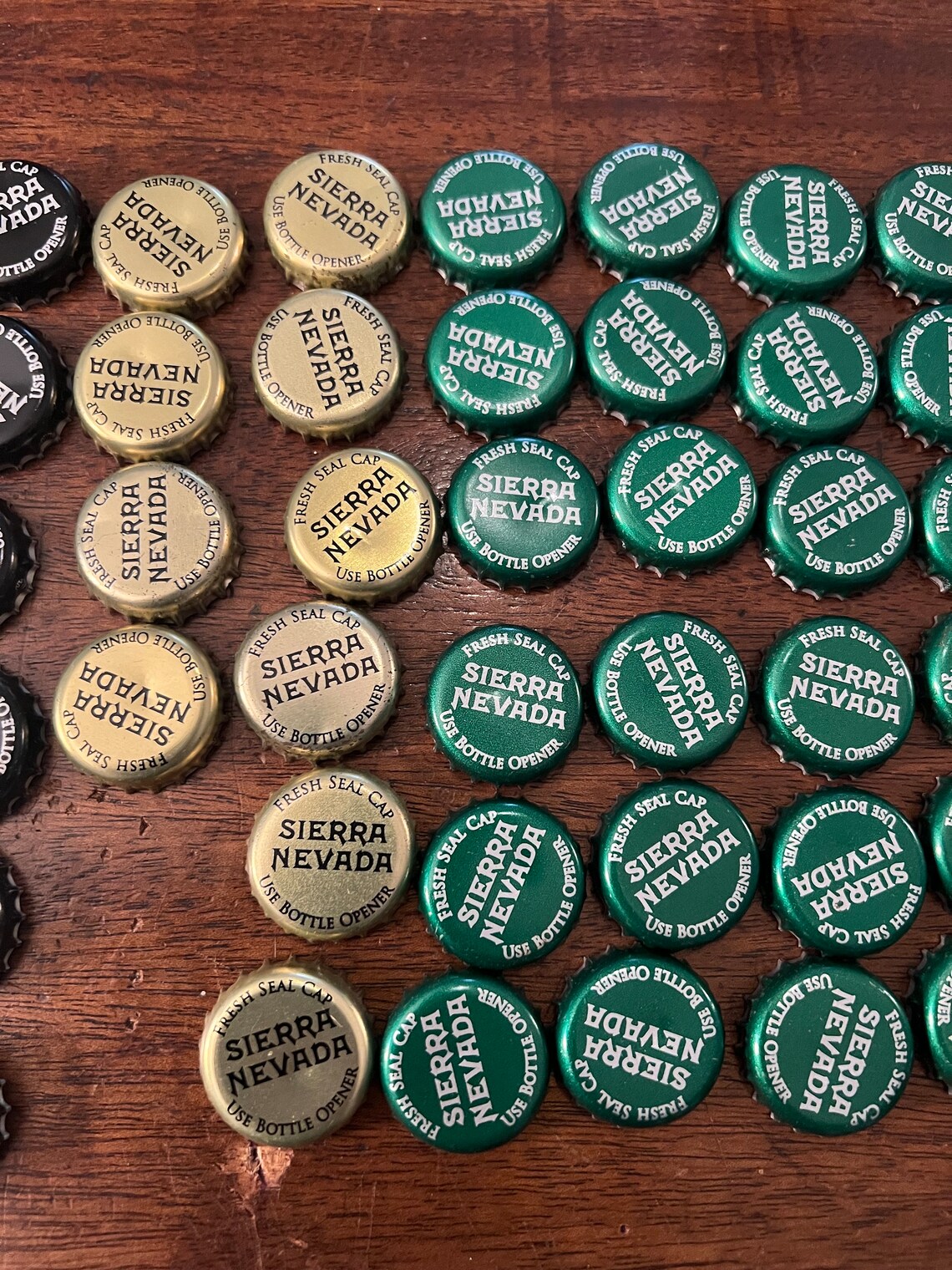 A Collection of 91 Sierra Nevada Beer Bottle Cap Green Beer Caps Black ...