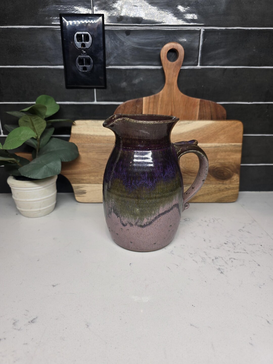 Hand-thrown Pottery Pitcher Featuring a Distinctive Brown, Green, and ...