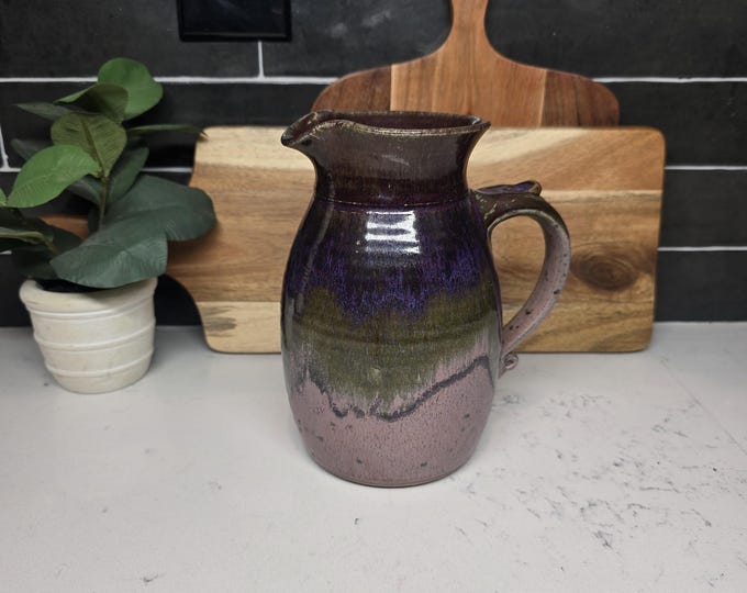 Hand-thrown Pottery Pitcher Featuring a Distinctive Brown, Green, and ...