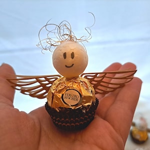 Christmas Angel Chocolate With Gold Wings, Ferrero Rocher Table ...