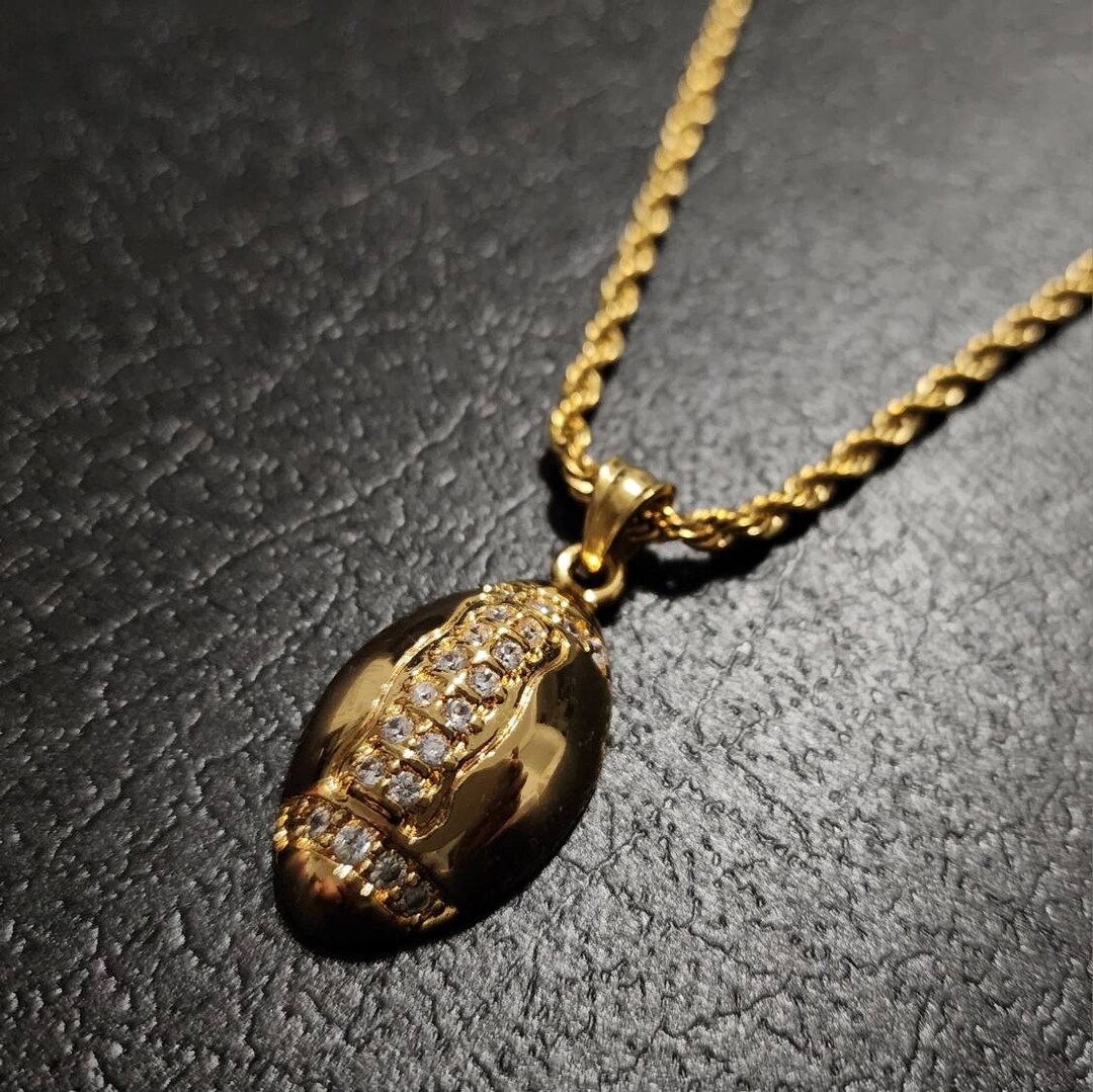 Gold Plated Football Pendant Necklace: Stainless Steel, Cubic Zirconia ...
