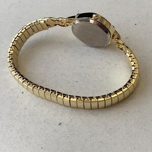 Collezio Goldtone Stretch Quartz Wrist Watch - Etsy