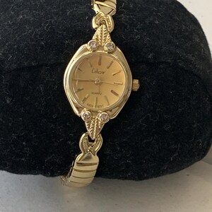 Collezio Goldtone Stretch Quartz Wrist Watch - Etsy