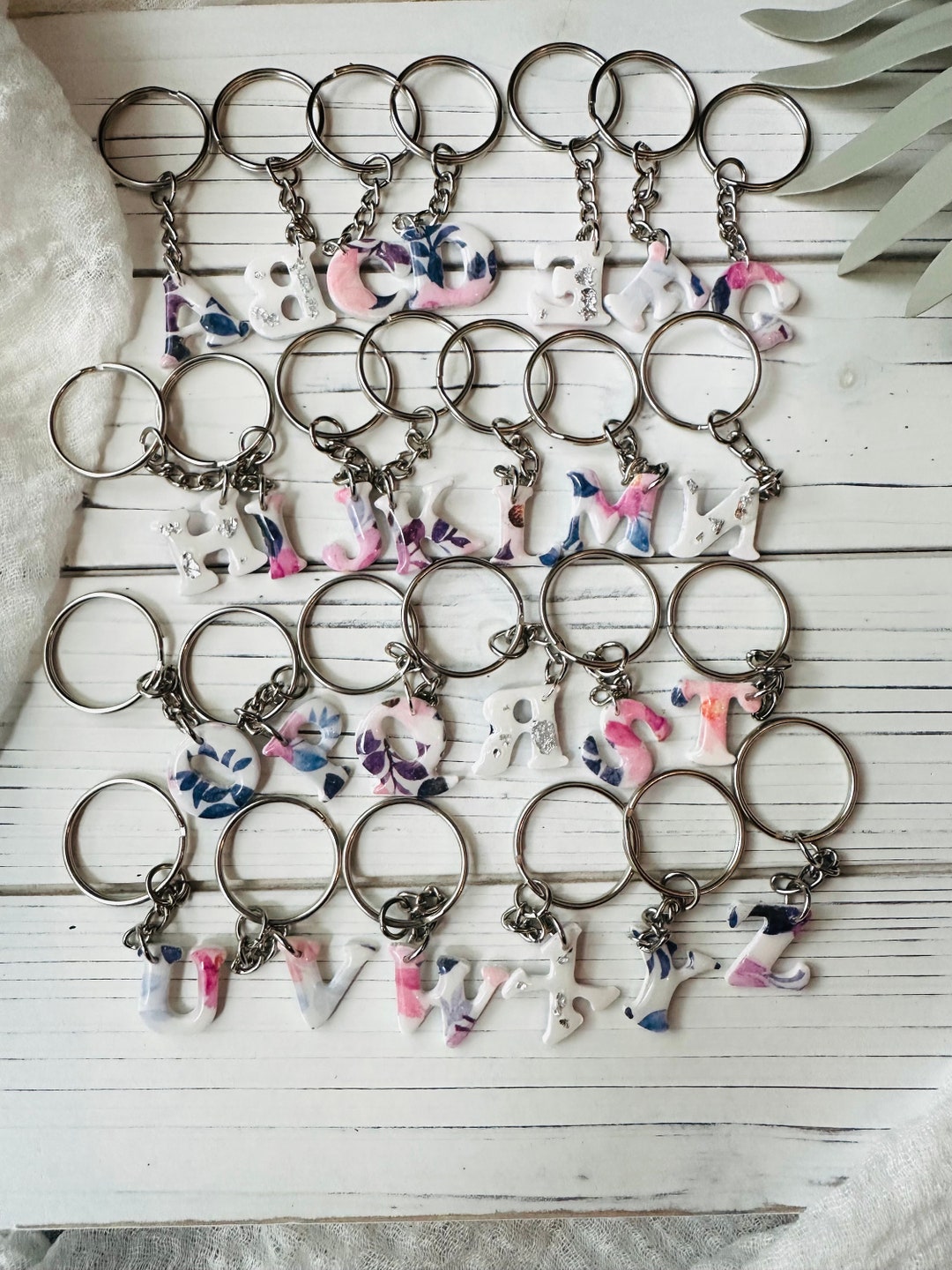 Clay Black With Silver Flakes and Pink and Purple Floral Design Letter ...