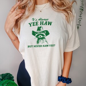 It's Always Yee Haw but Never Haw Yee? Raccoon Cowboy T Shirt, Funny ...