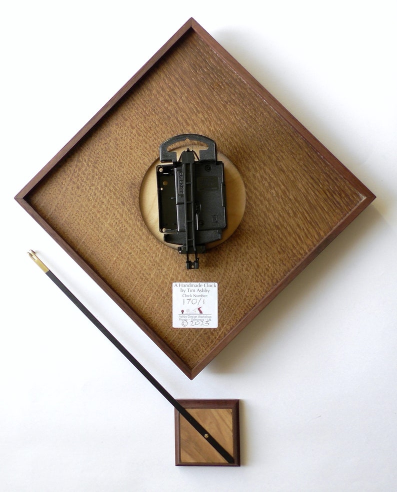 Exotic Wood Wall Clock. Pendulum Wall Clock in Olive Wood and Black ...