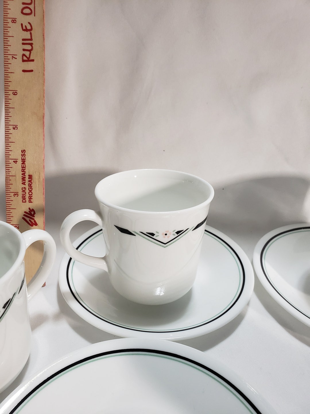 Corelle by Corning Coffee Cup and Saucer Zenith Pattern Black, White ...