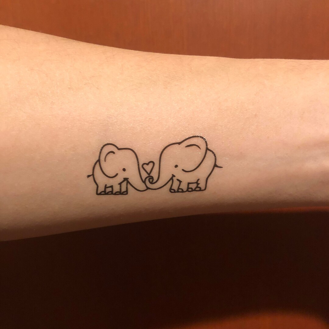 Cute Elephant Outline Tattoo