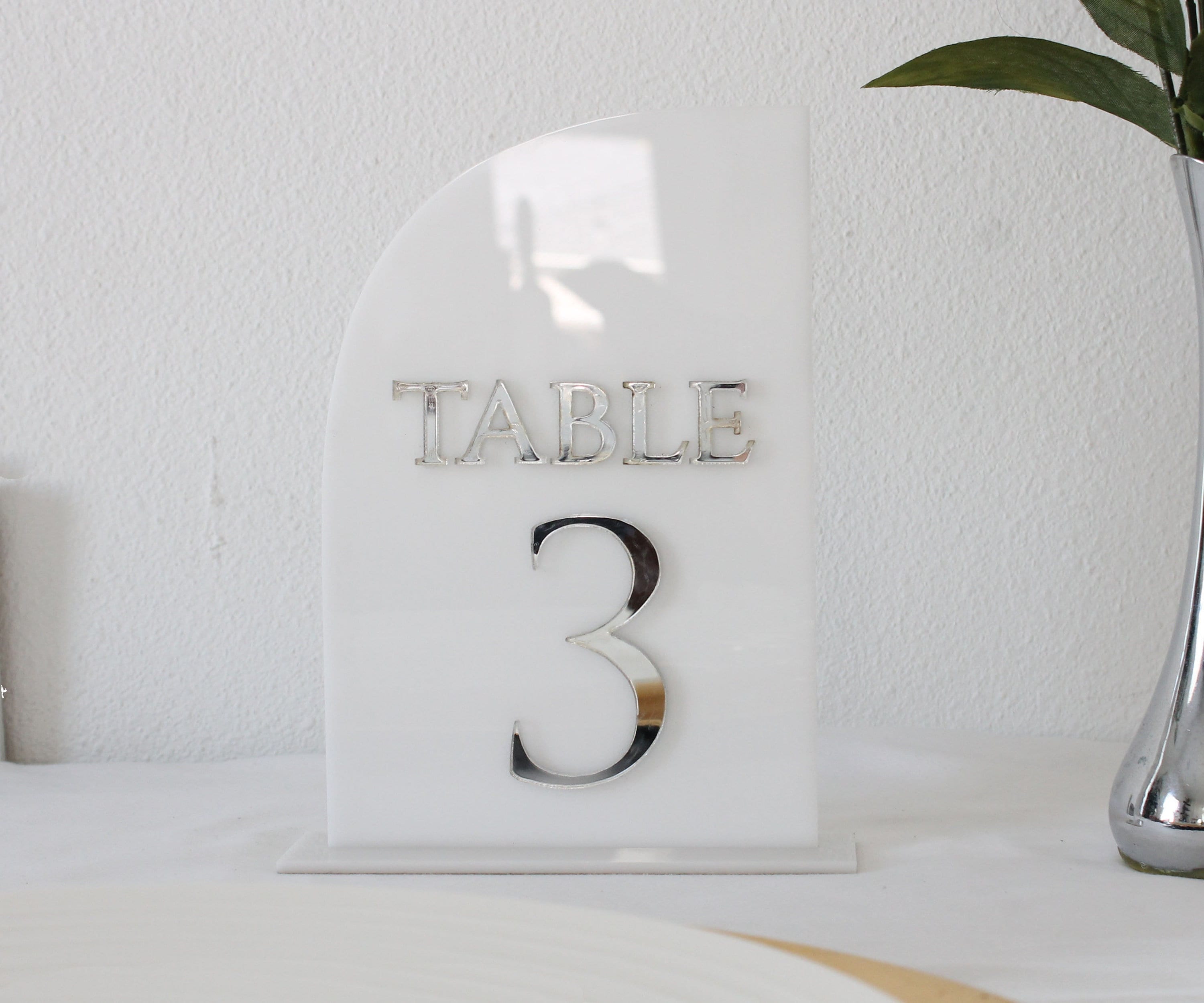 Silver wedding table numbers | Beachweddingtips.com