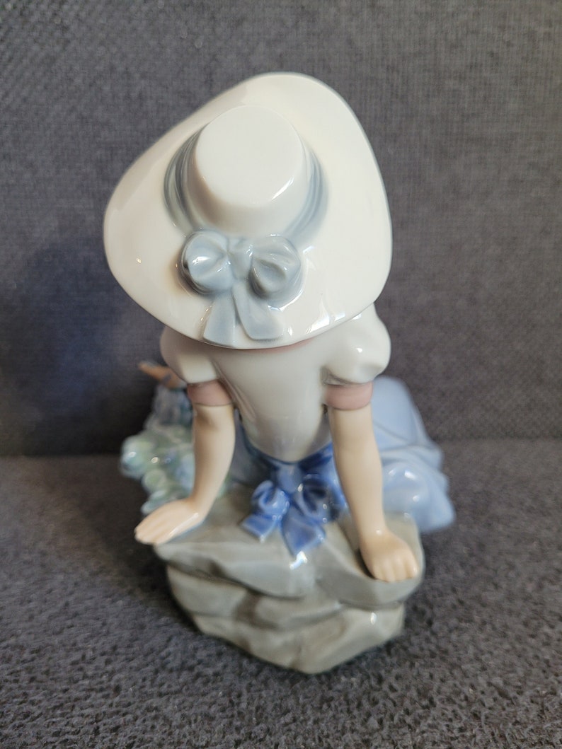 NAO by Lladro 6-inch Porcelain Figurine listening to Birds Sitting Girl ...