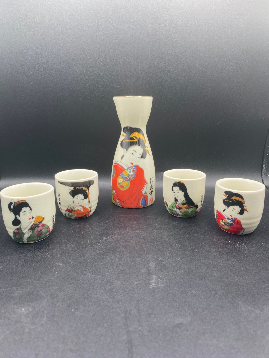 Sake Set With 4 Cups and Sake Holder Different Designs of Women’s Face ...