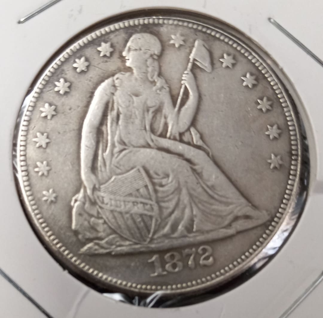 Reproducción de la ficha de tributo del dólar de 1872 con la libertad ...