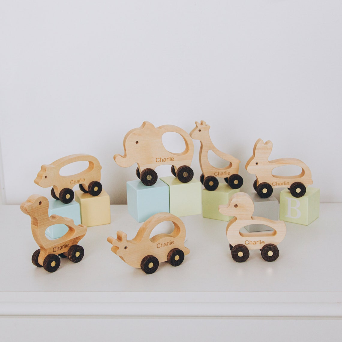 Wooden Animals on the Wheels. Personalized Baby Toy. Sensory Toddler ...