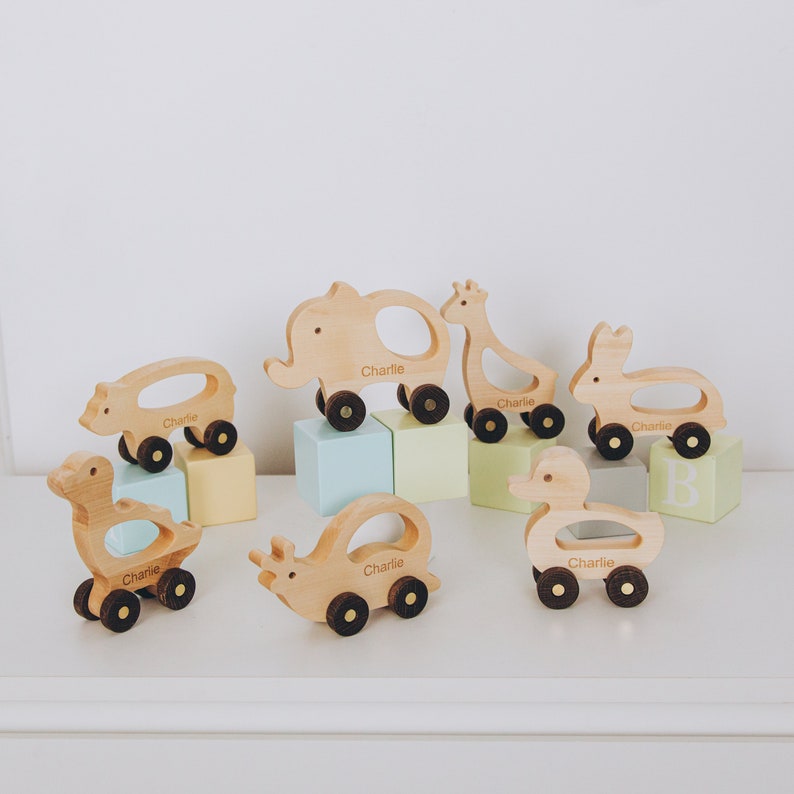 Wooden Animals on the Wheels. Personalized Baby Toy. Sensory Toddler ...
