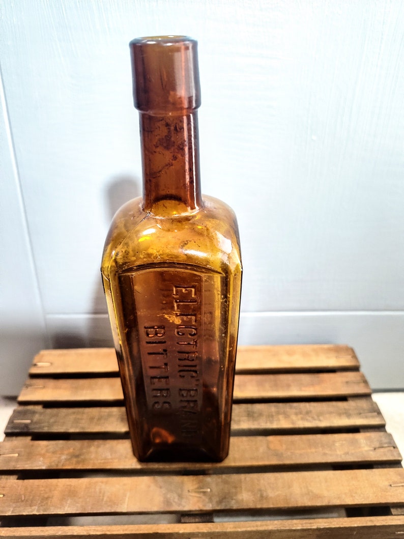 1906 electric Brand Bitters, the New Discovery, the Great Family Remedy ...