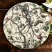 Botanical Whimsy Round Metal Sign, Entwined Vines, Vibrant Blooms ...