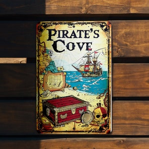 Pirate's Cove Vintage Metal Sign: Treasure Chest, Nautical Colors ...