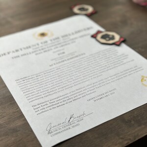 Helldivers 2 Collectible Medal Set Featuring Commendation Letter From ...