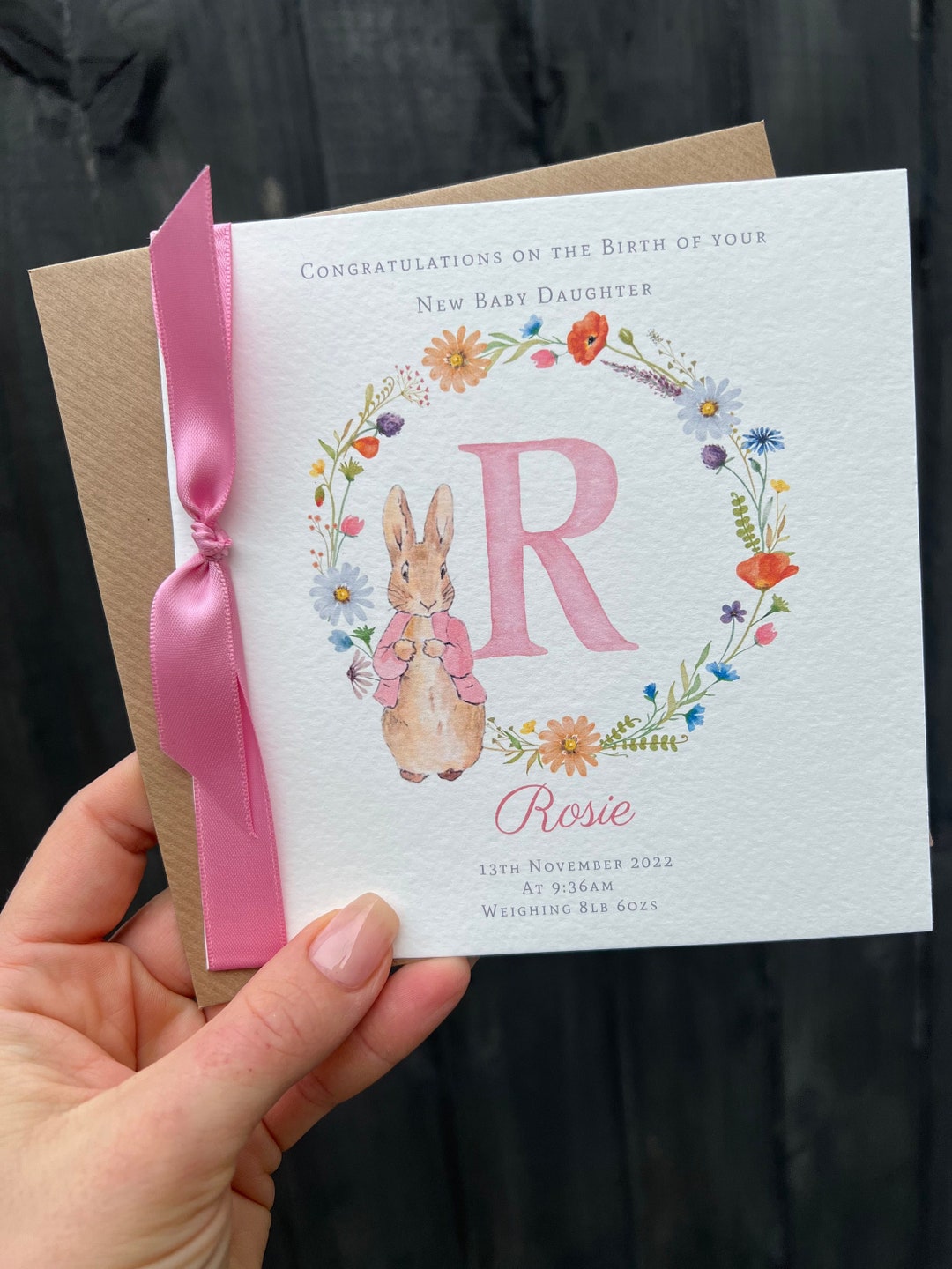 Personalised Handmade Peter Rabbit New Baby Card, Flower Wreath, Pink ...